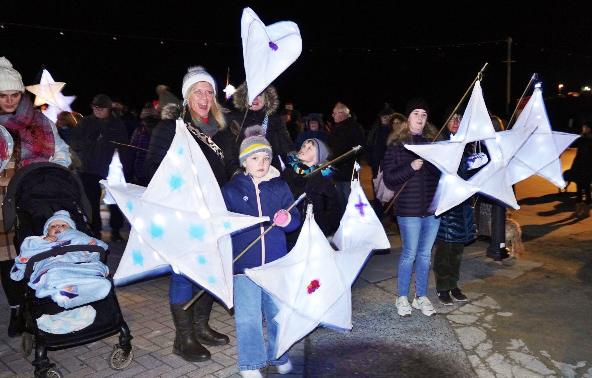 Carnival royalty light up the town during Looe Christmas lights event ...