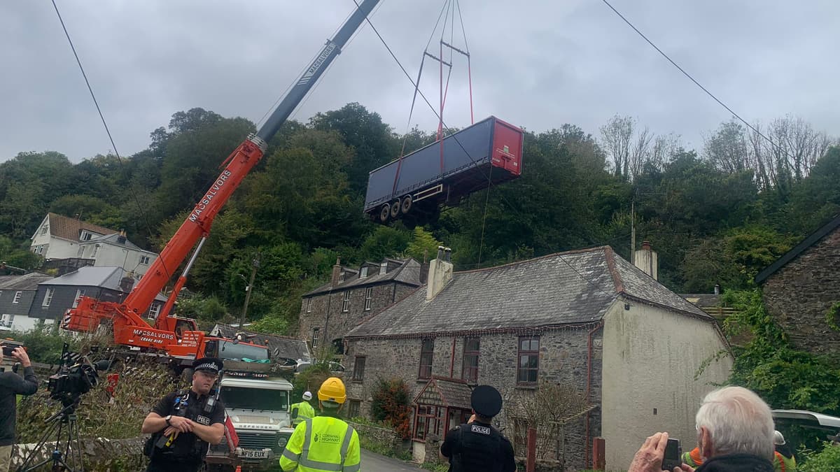 Up, up and away as crane extracts lorry stuck in a Forder lane ...