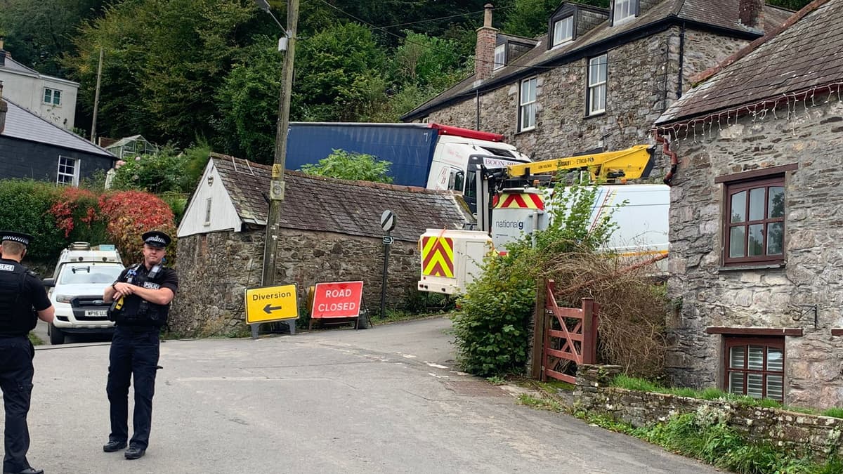 Work begins to free haulage truck stuck in narrow lane at Forder in ...